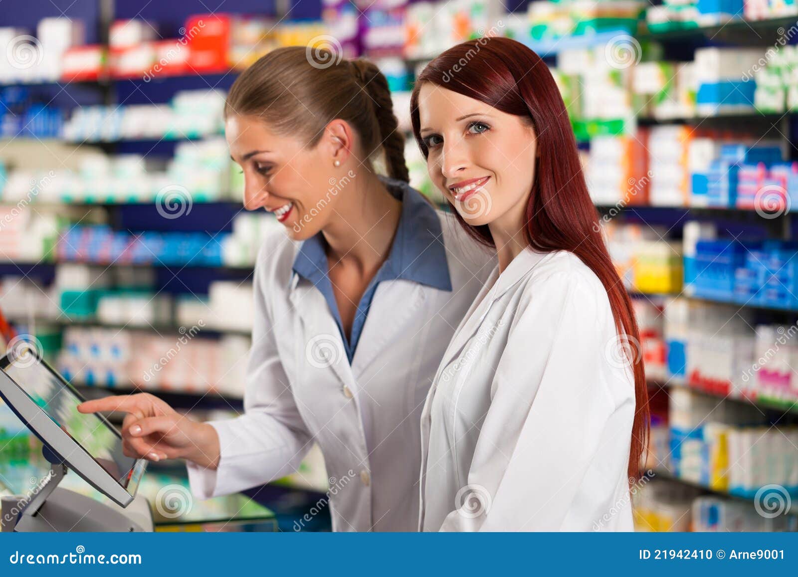 Pharmacist with Assistant in Pharmacy Stock Photo - Image of industry ...