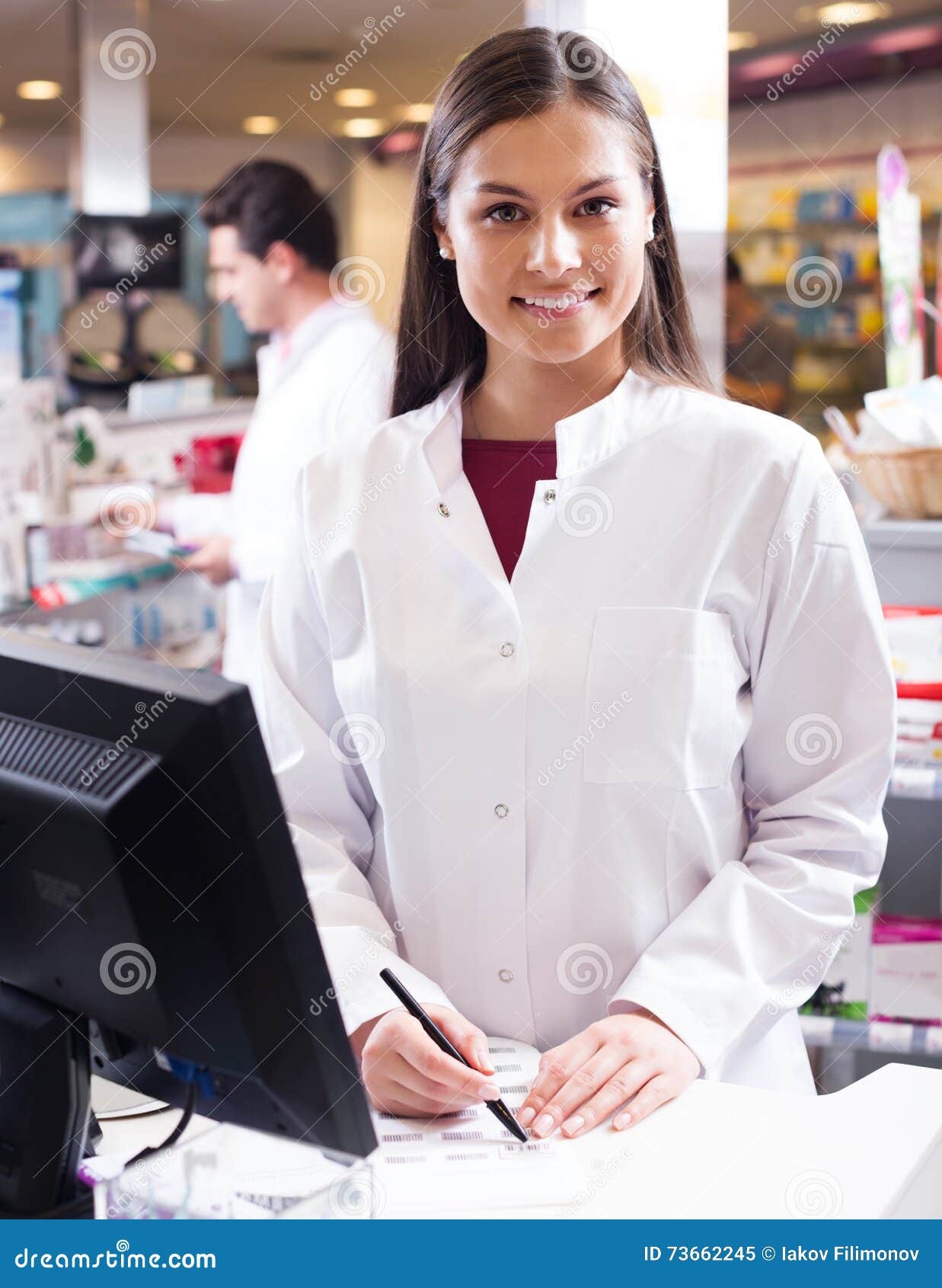 Pharmacist and Assistant Working Stock Image - Image of female, cash ...
