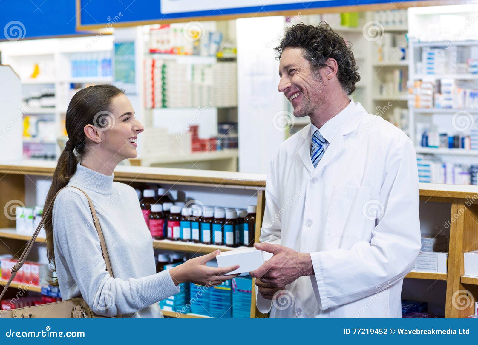 Pharmacist Assisting the Pills To Customer Stock Photo - Image of ...