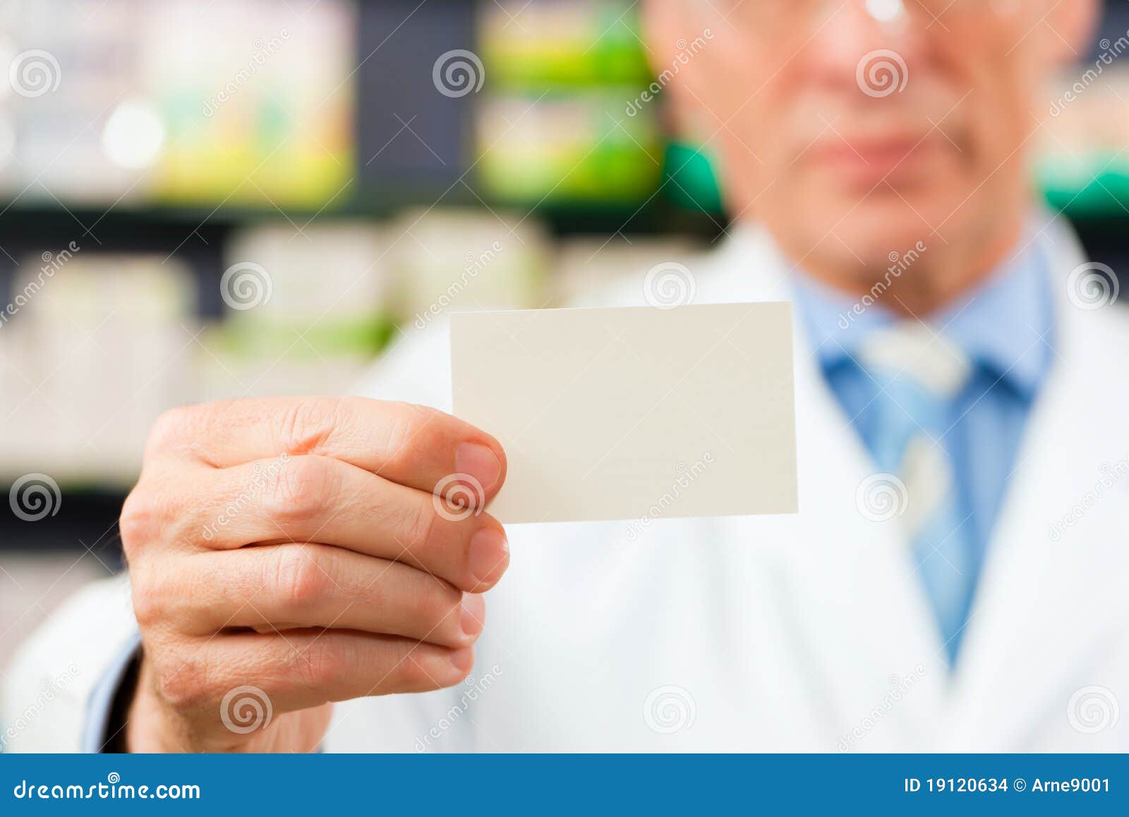 Pharmacist with Business Card in Pharmacy Stock Photo - Image of close ...