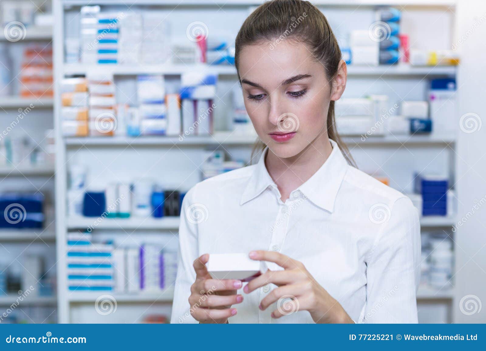 Pharmacist Checking a Medicine Box Stock Image - Image of caucasian ...