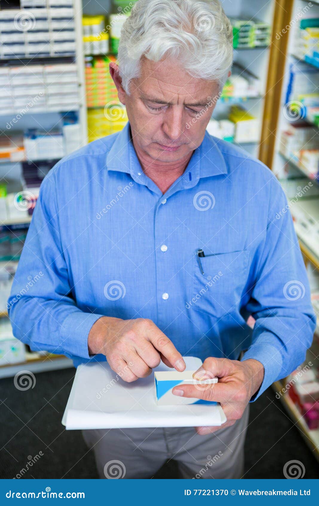 Pharmacist Checking Medicines Stock Photo - Image of formal, drugstore ...