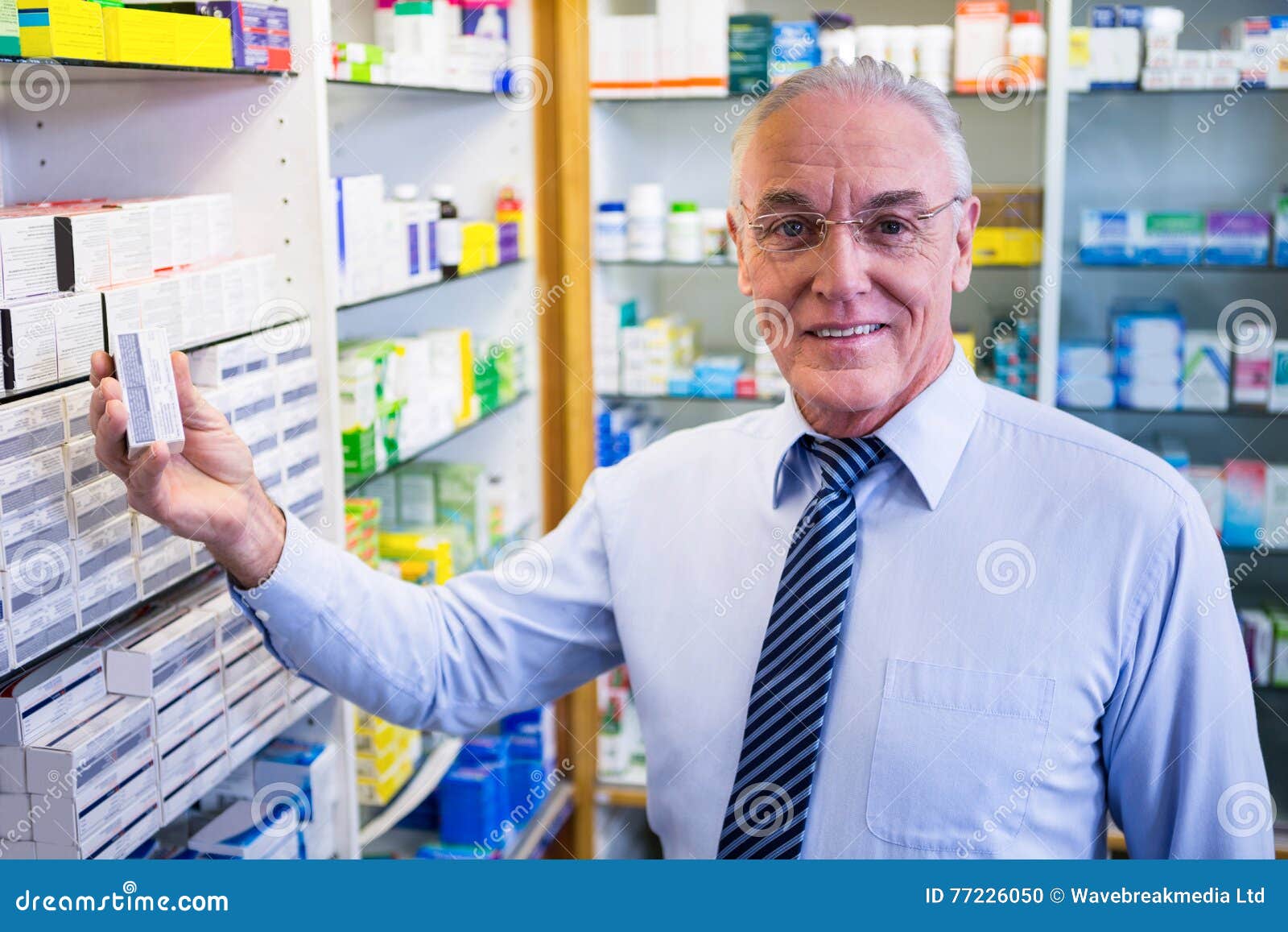 Pharmacist Checking Medicines in Pharmacy Stock Photo - Image of male ...