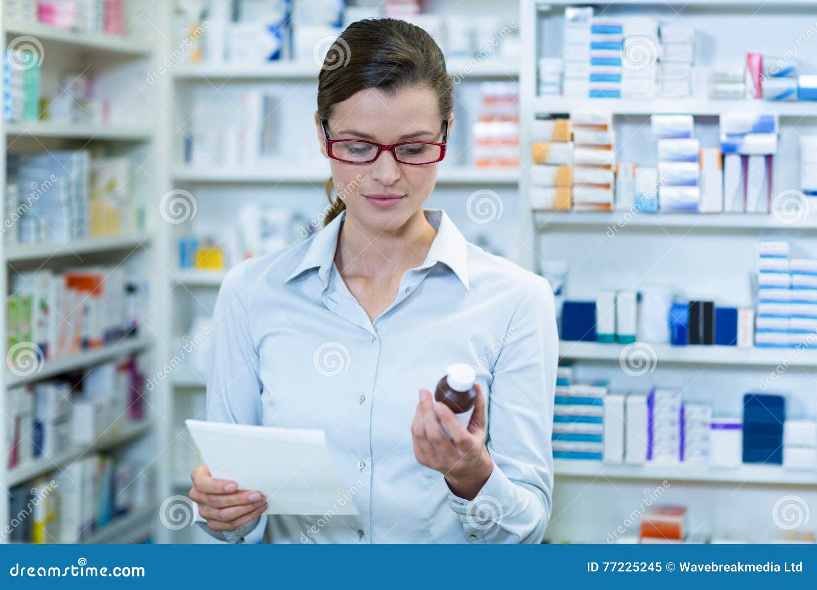 Pharmacist Checking at Prescription and Medicine Container Stock Image ...