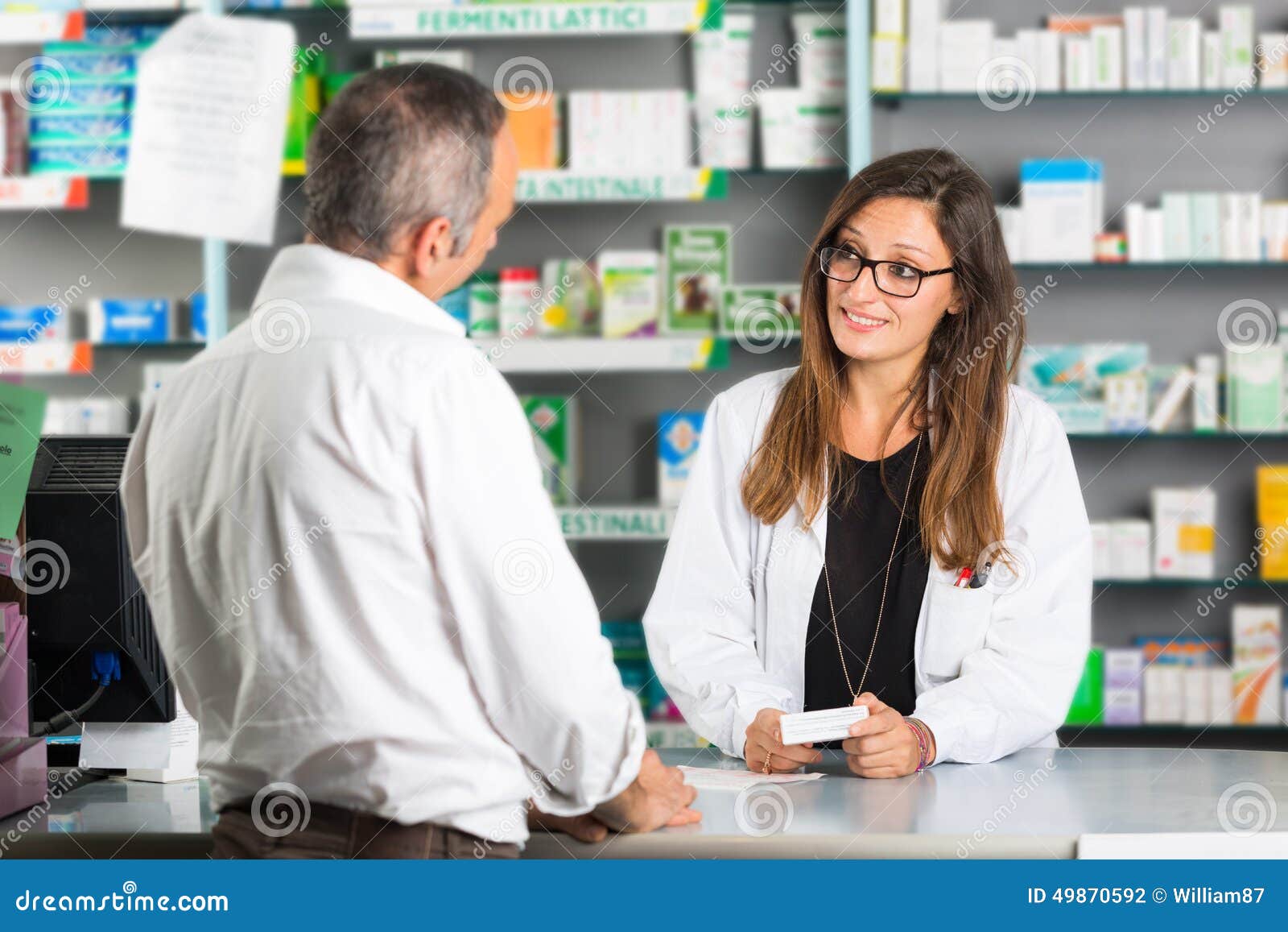 Pharmacist and Client stock photo. Image of occupation - 49870592