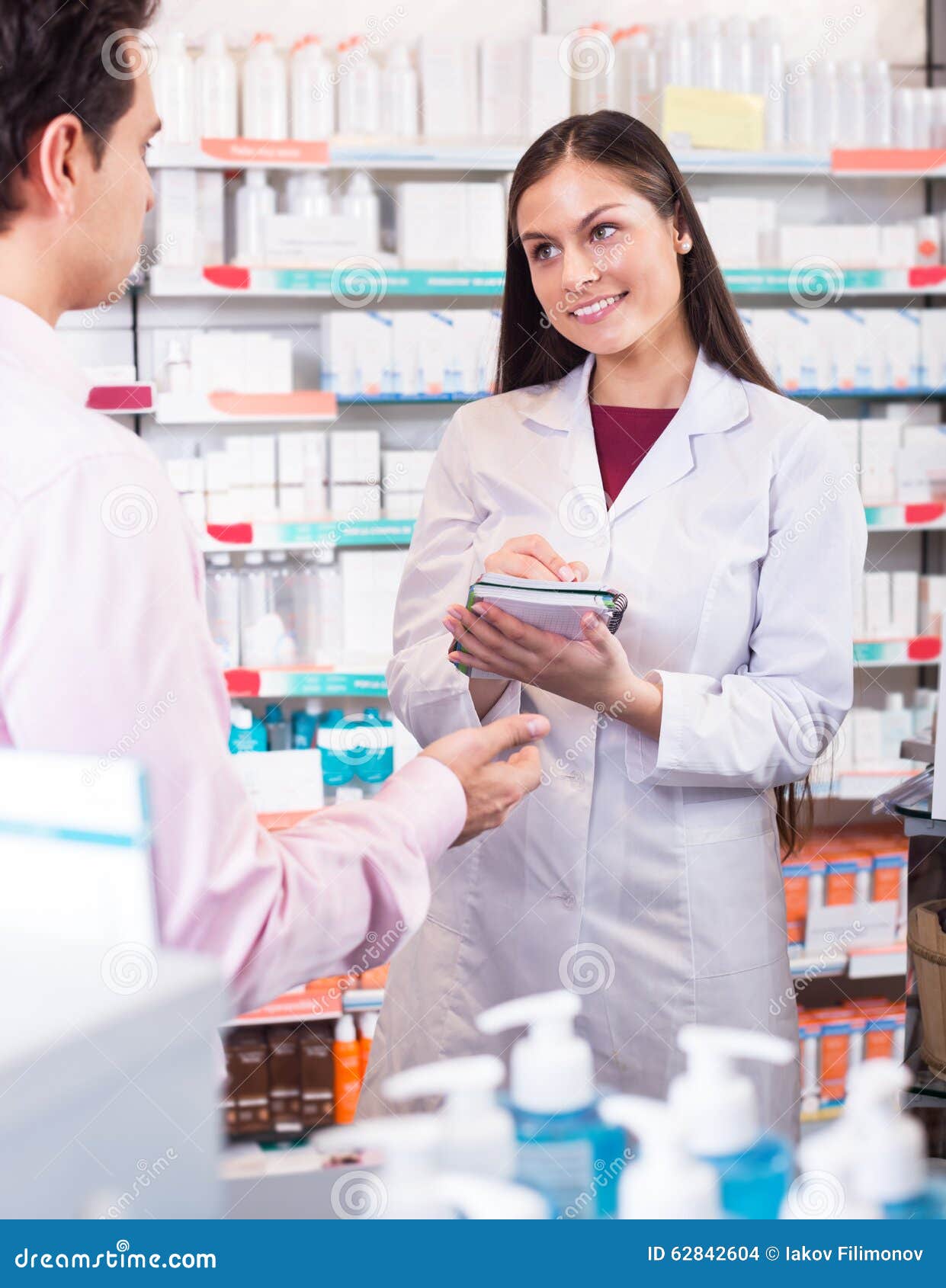 Pharmacist and Consulting Man in Pharmacy Stock Photo - Image of ...