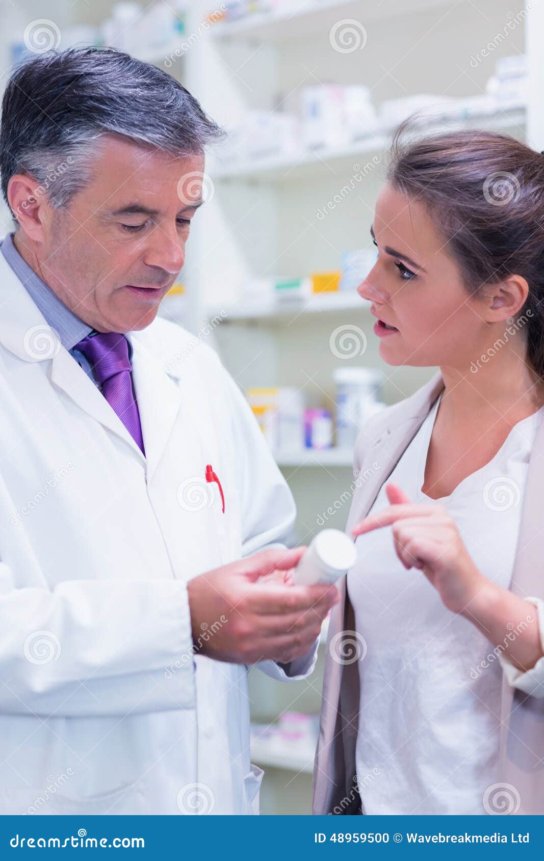 Pharmacist and Customer Talking about Medication Stock Photo - Image of ...