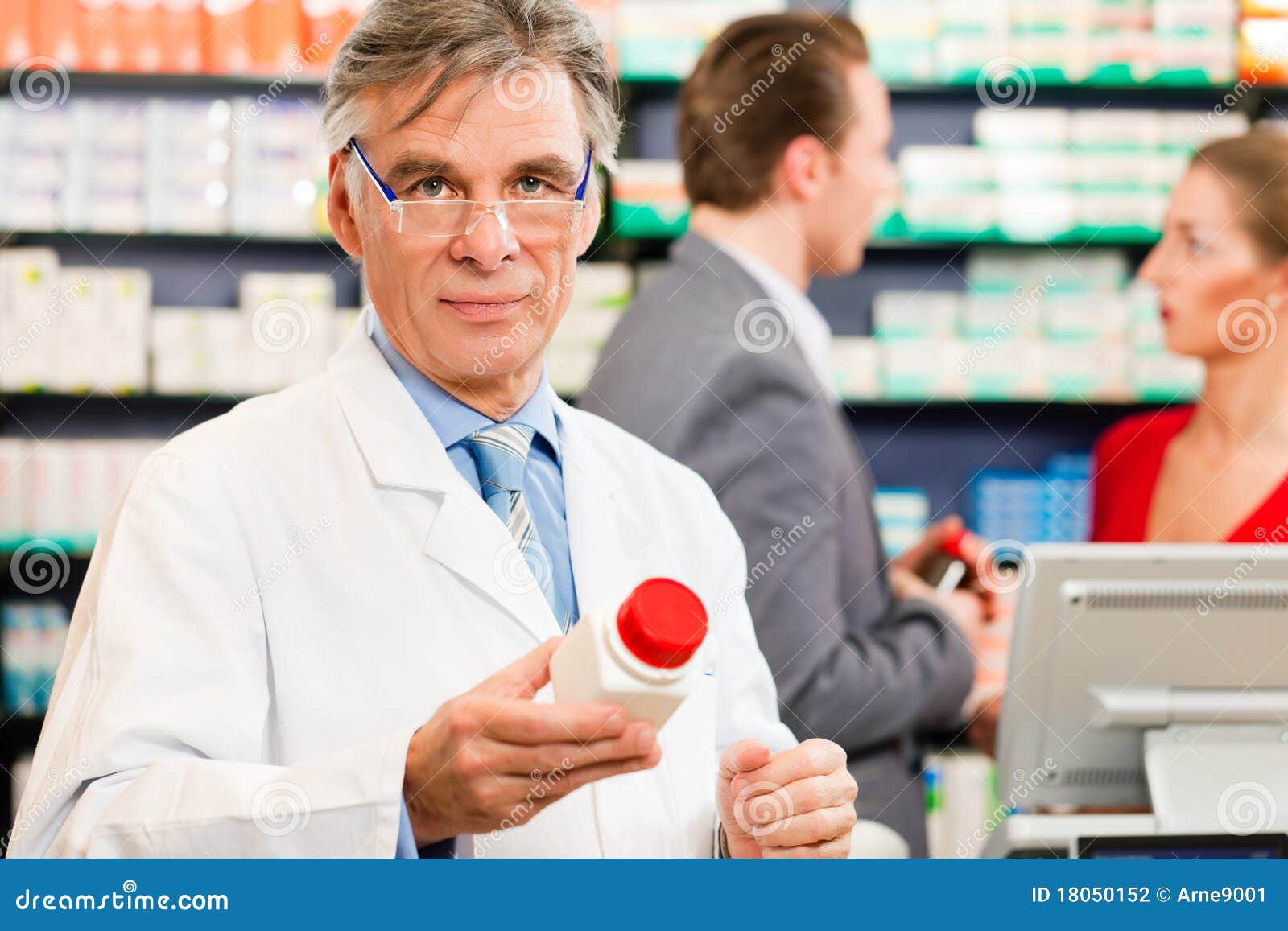 Pharmacist with Customers in Pharmacy Stock Photo - Image of container ...