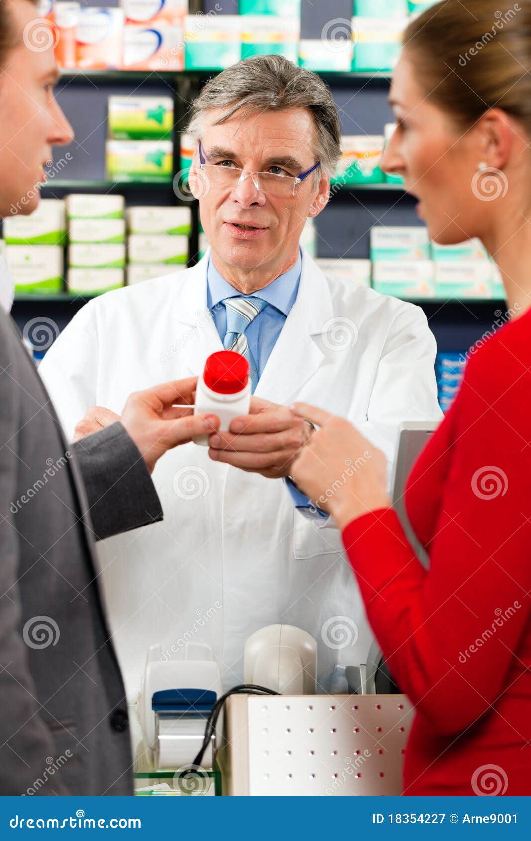 Pharmacist with Customers in Pharmacy Stock Image - Image of health ...