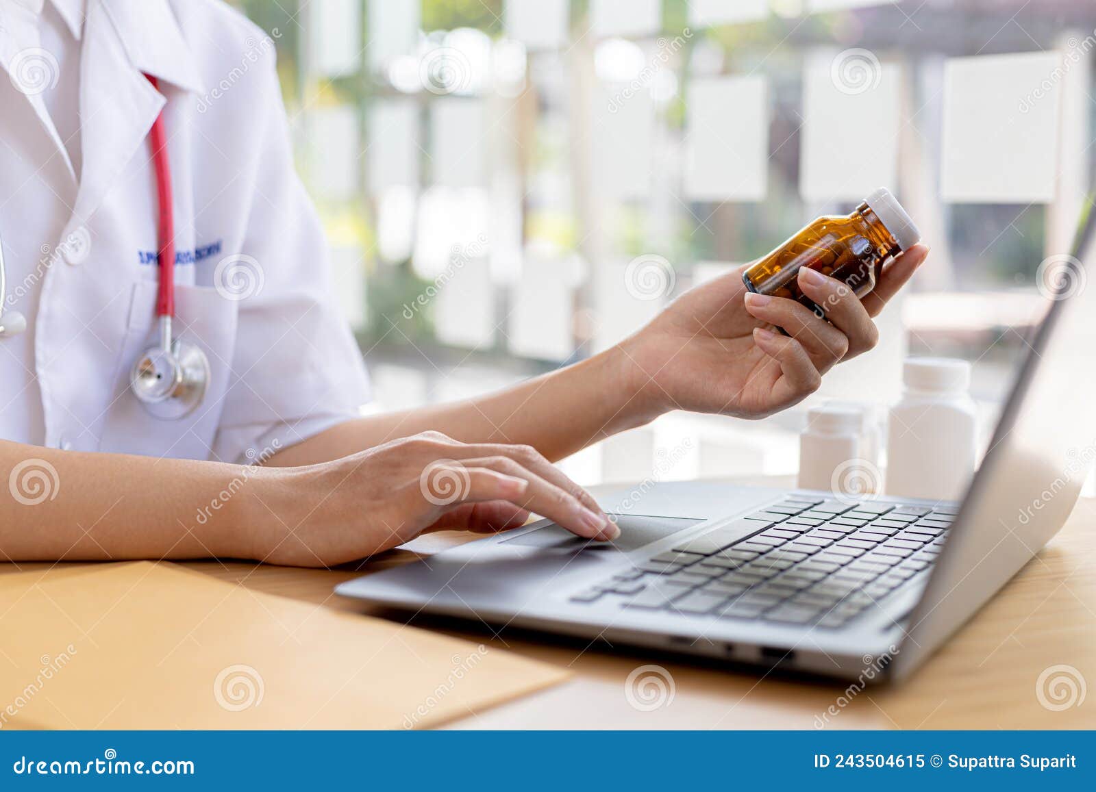 The Pharmacist is Entering the Information of the Medicines Received ...