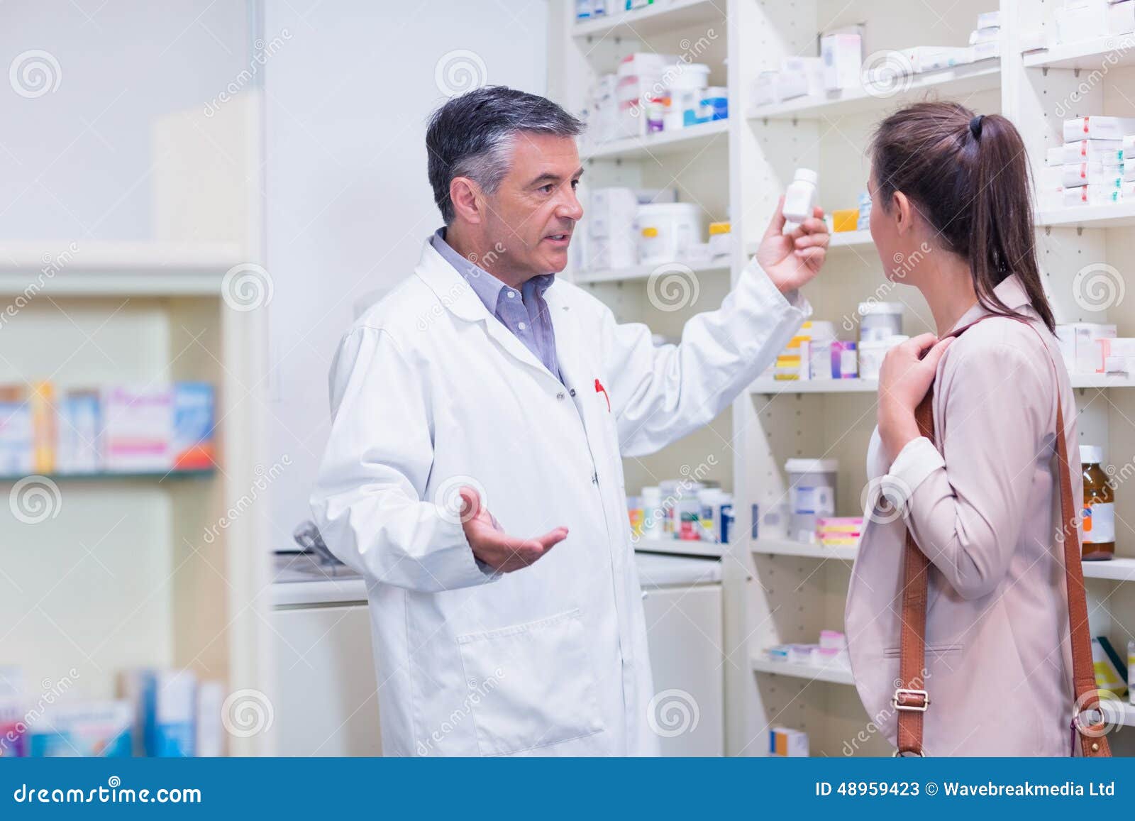 Pharmacist Explaining Medicine To Patient Stock Image - Image of view ...