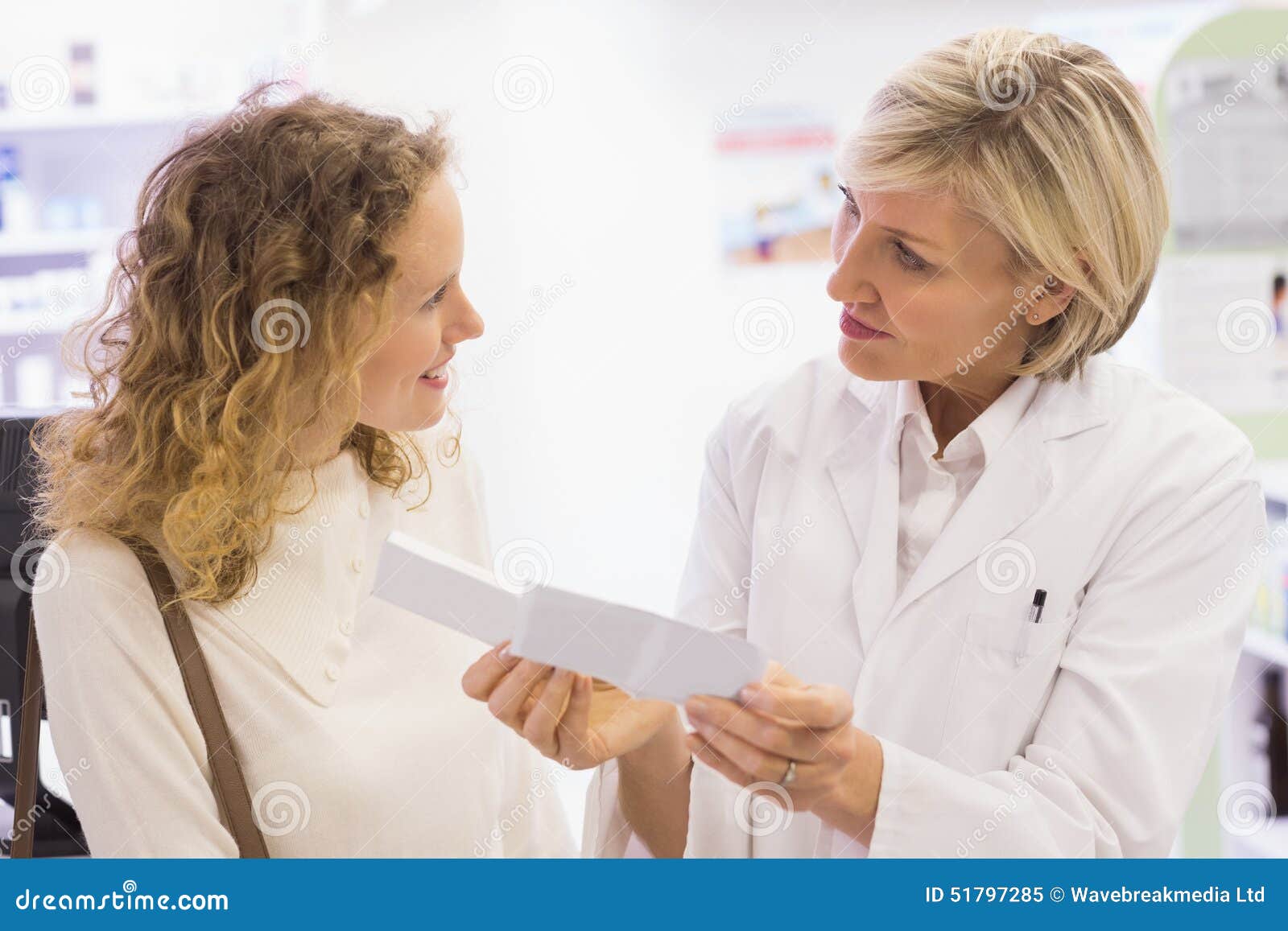 Pharmacist Explaining the Prescription To Patient Stock Image - Image ...