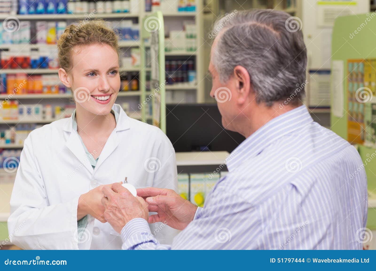 Pharmacist Explaining Something To a Customer Stock Photo - Image of ...