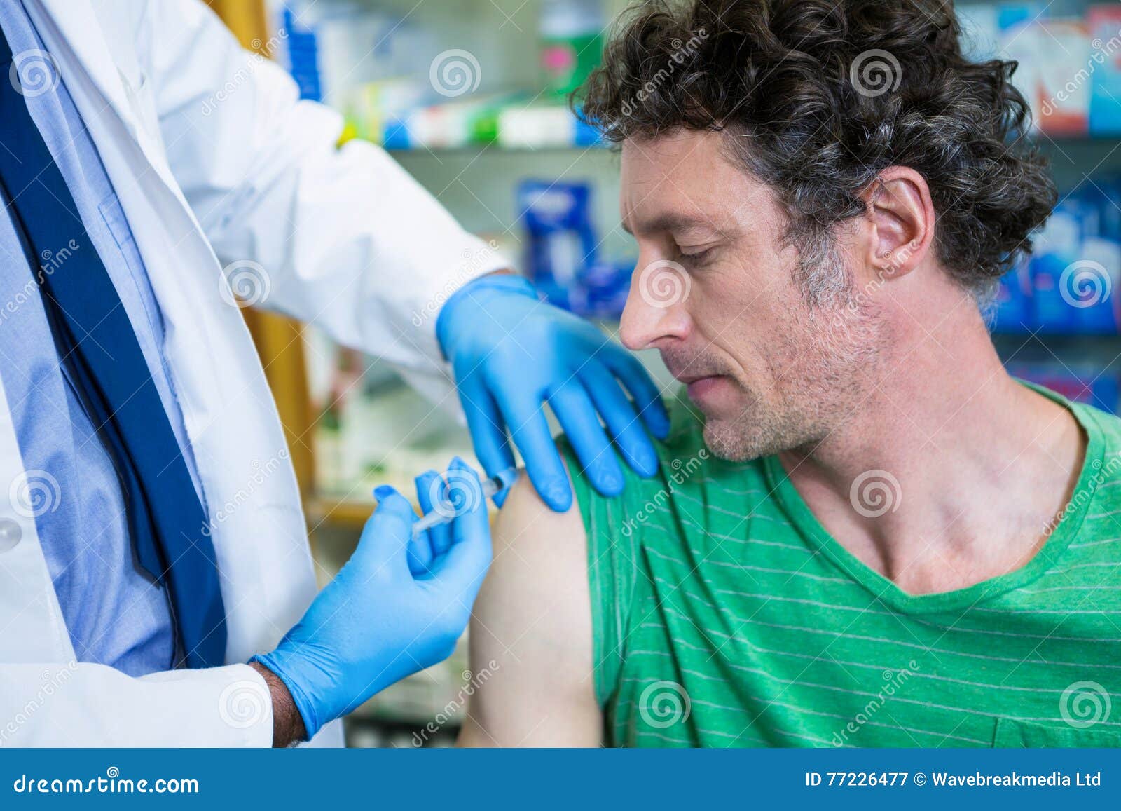 Pharmacist Giving Injection To Patient Stock Image - Image of ...