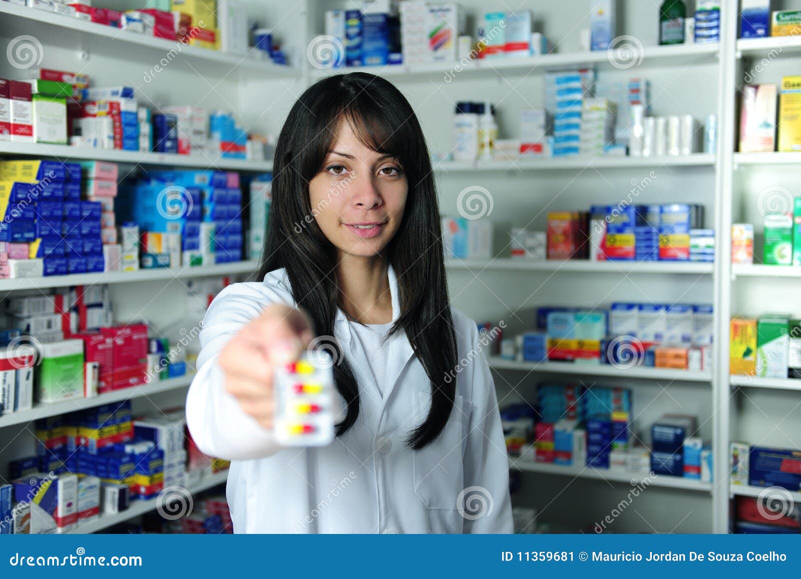 Pharmacist holding pills stock image. Image of black - 11359681
