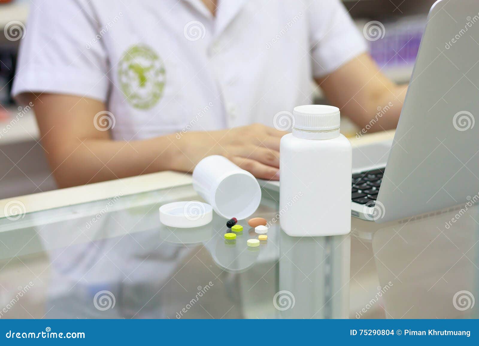 Pharmacist with Laptop Computer and Medication Stock Photo - Image of ...
