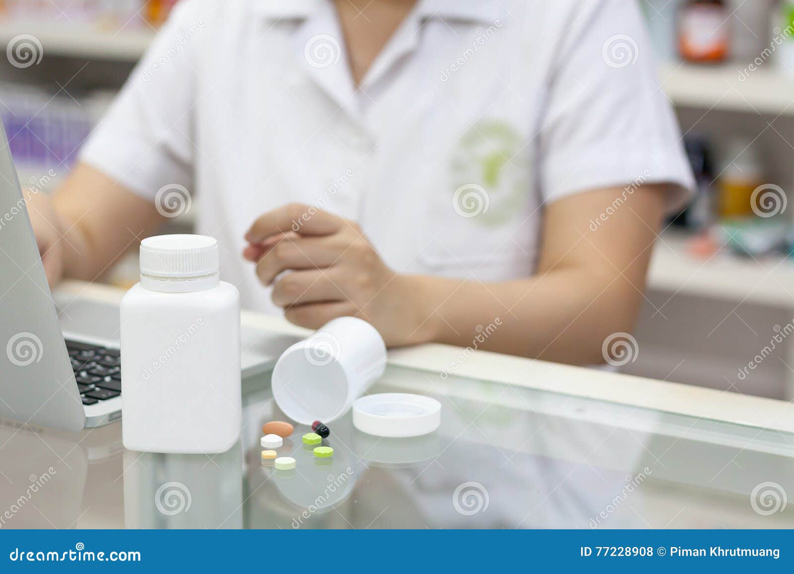 Pharmacist with Laptop Computer and Medication Stock Photo - Image of ...