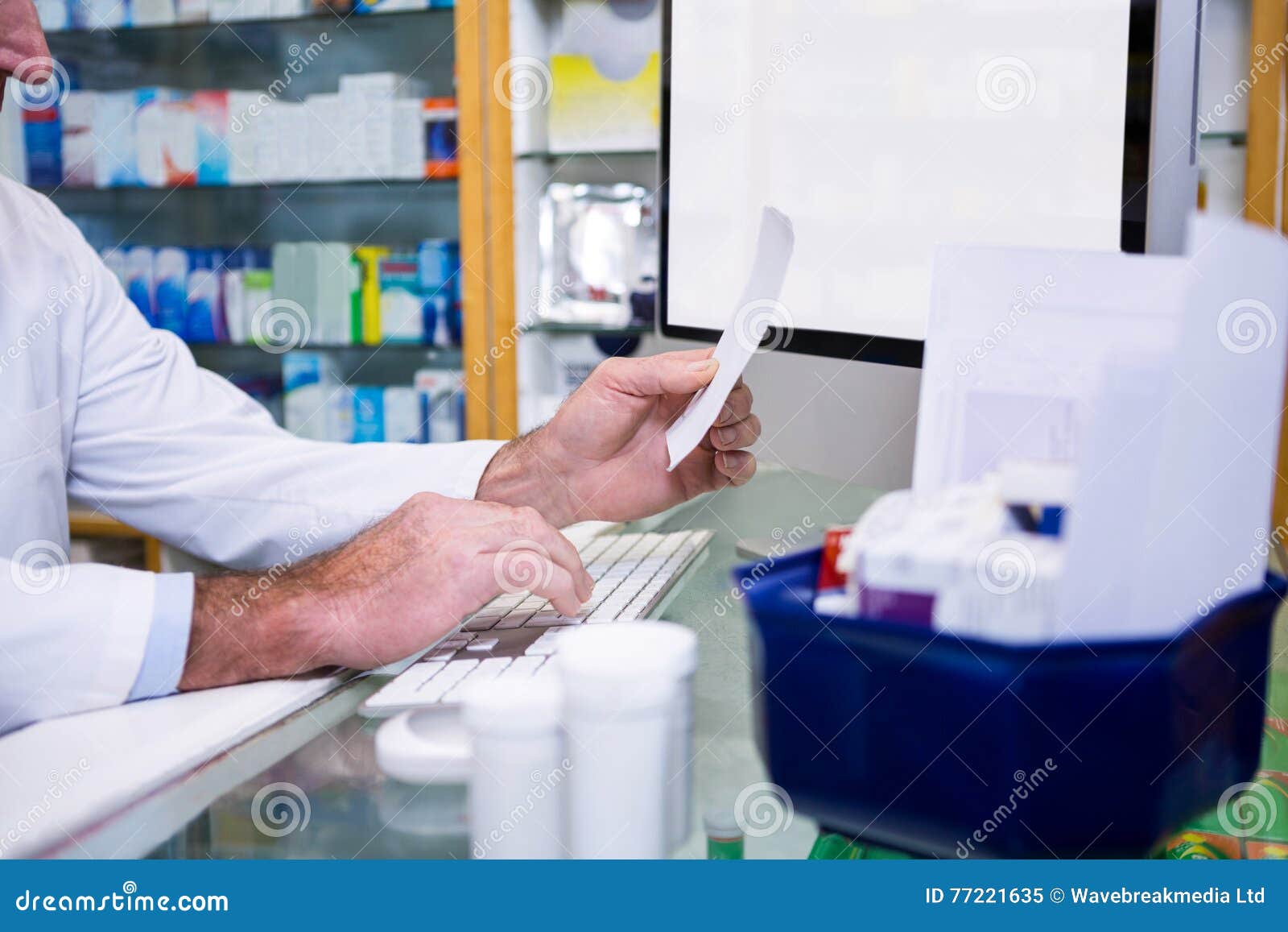 Pharmacist Making Entries on Computer Stock Image - Image of pharmacist ...
