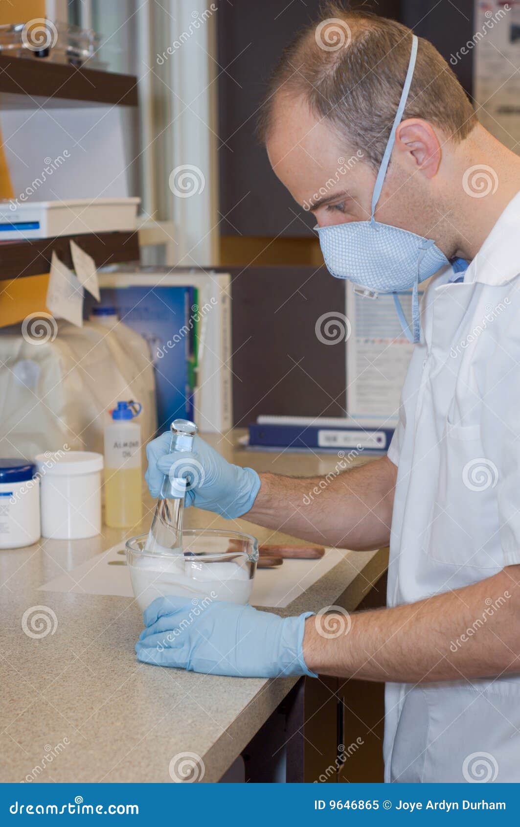 Pharmacist mixing medicine stock image. Image of color - 9646865