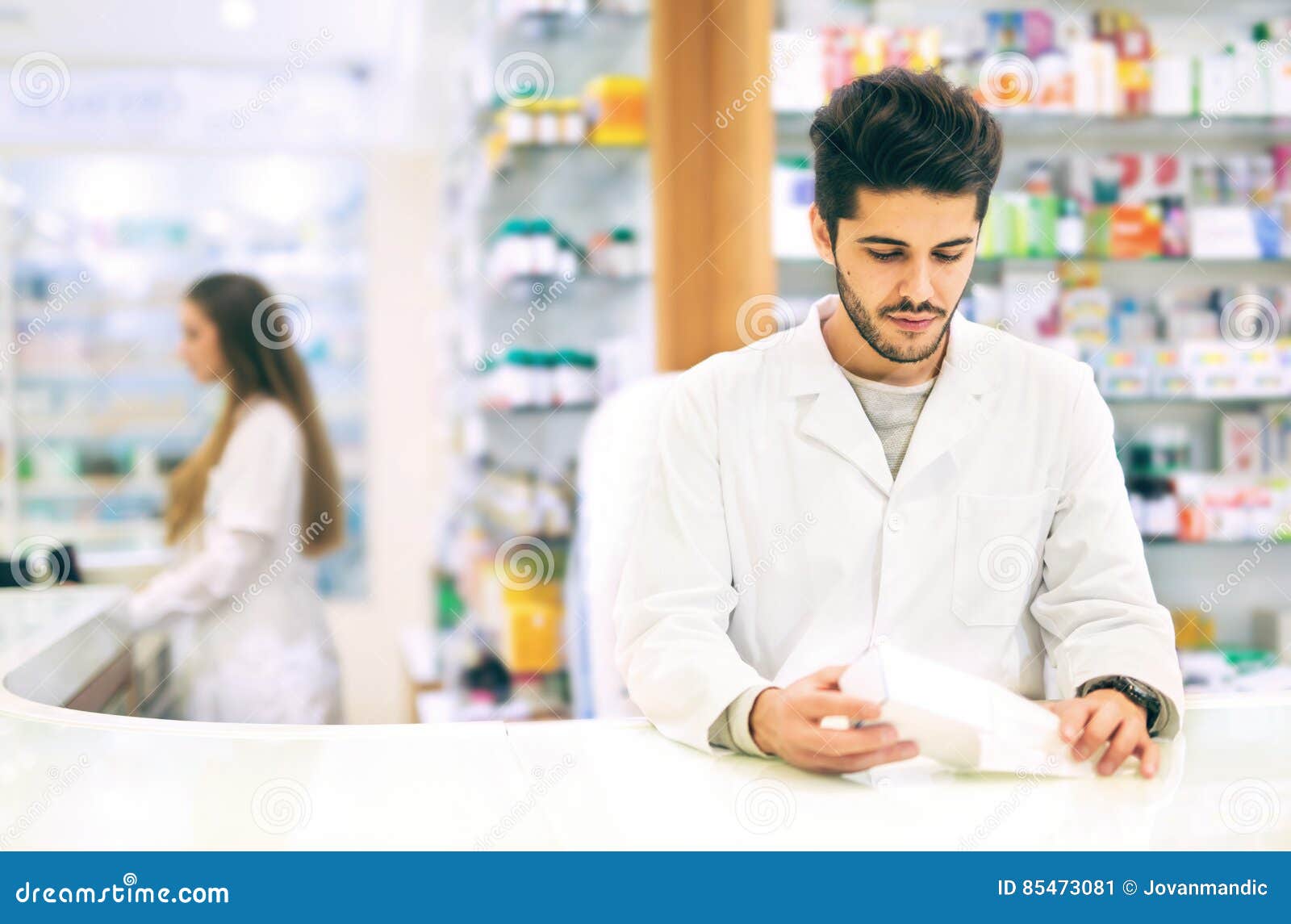 Pharmacist Packing Drugs at the Pharmacy Stock Image - Image of ...