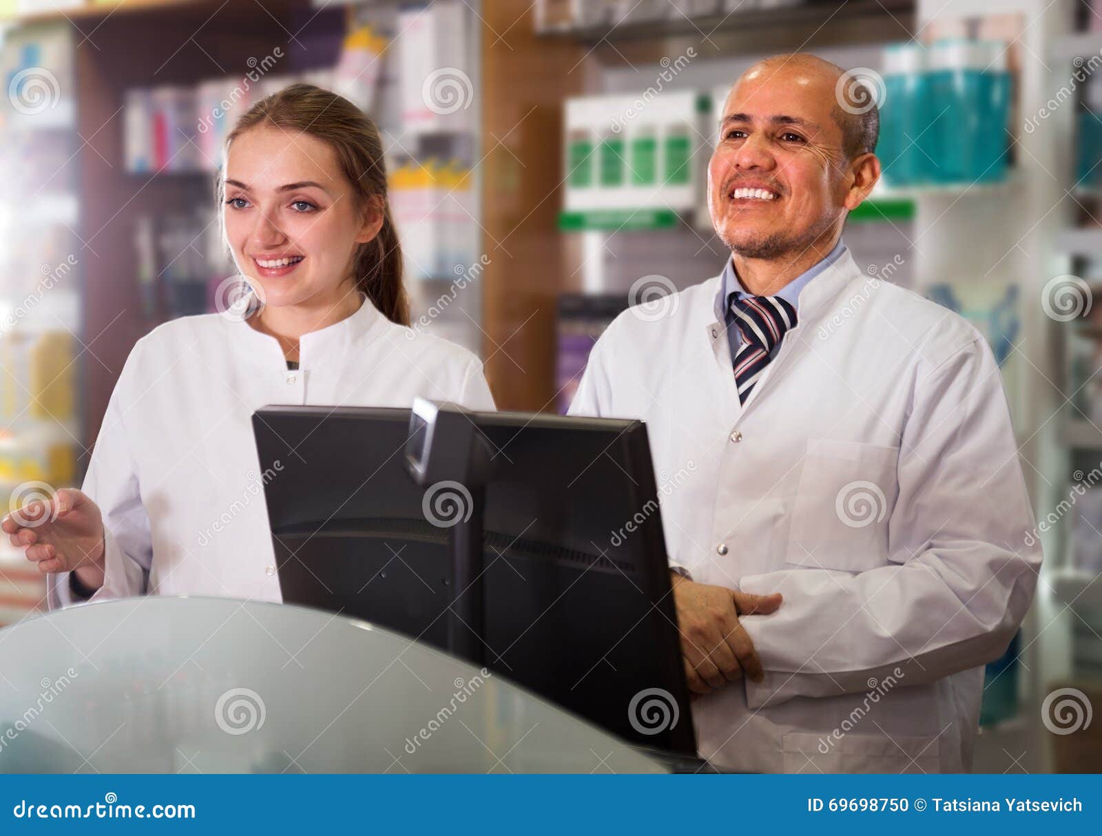 Pharmacist and Pharmacy Technician in Drugstore Stock Photo - Image of ...
