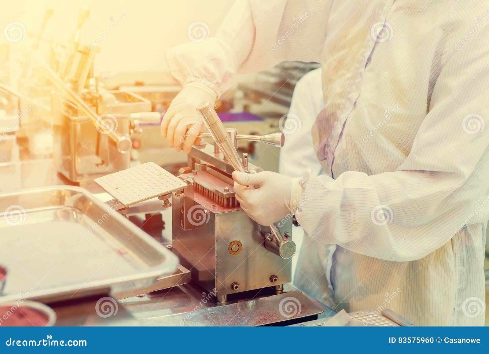 Pharmacist Preparing Medication with Packaging Capsule in Lab Stock ...