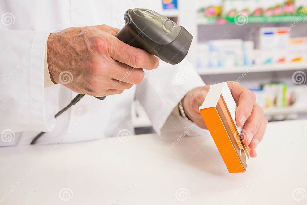 Pharmacist Scanning Medication with a Scanner Stock Photo - Image of ...