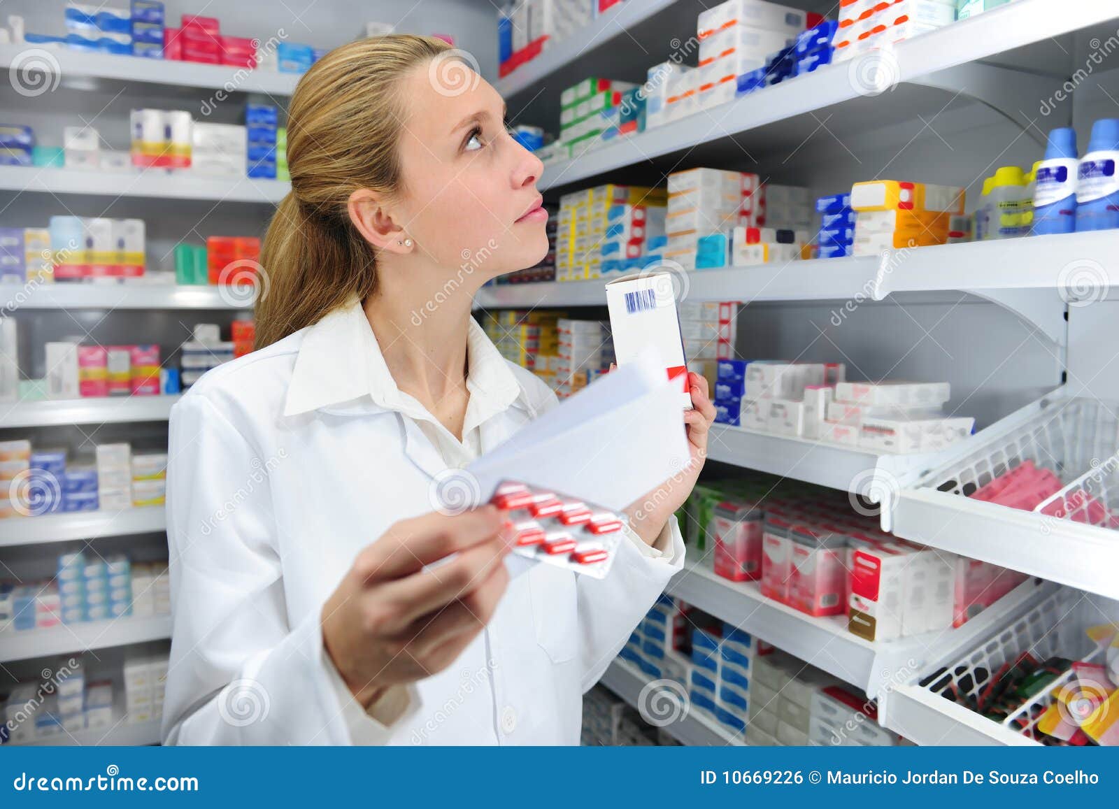 Pharmacist Searching Medicine Stock Photo - Image of indoors, holding ...