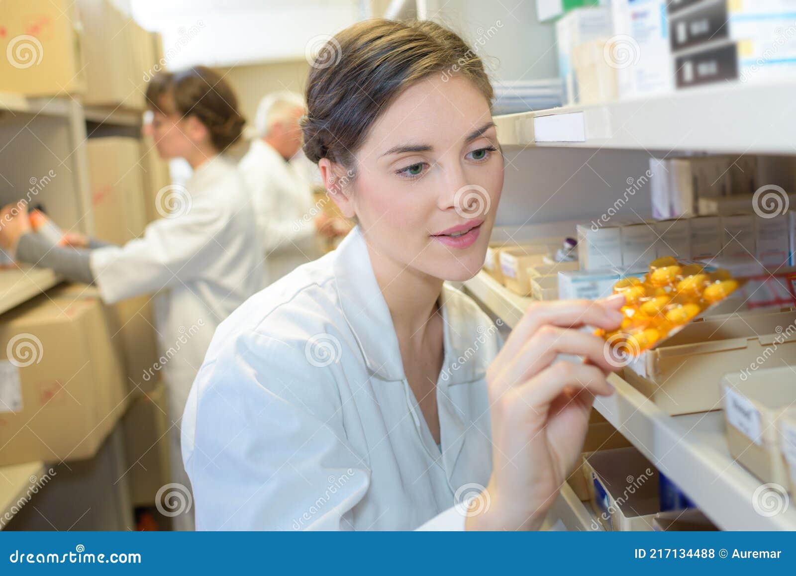 Pharmacist Selecting Medication Stock Photo - Image of cure, medicinal ...