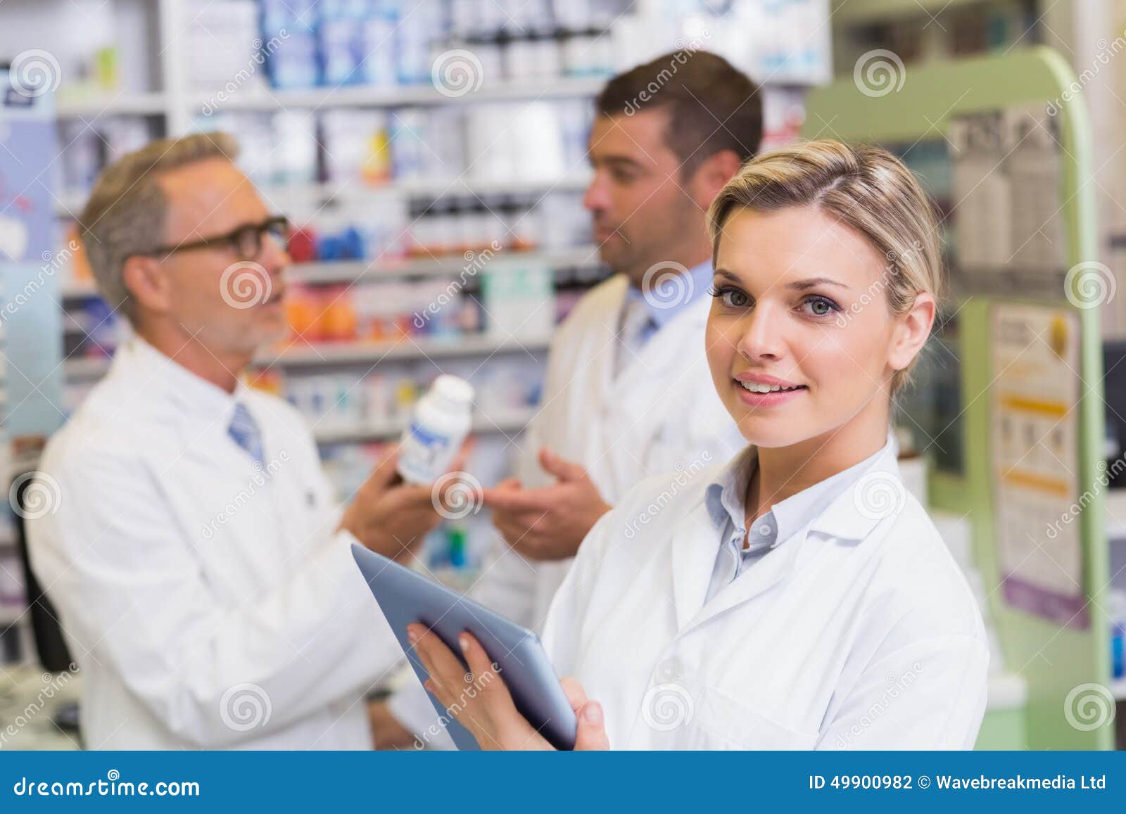 Pharmacist Smiling at Camera Stock Photo - Image of medicament, drug ...