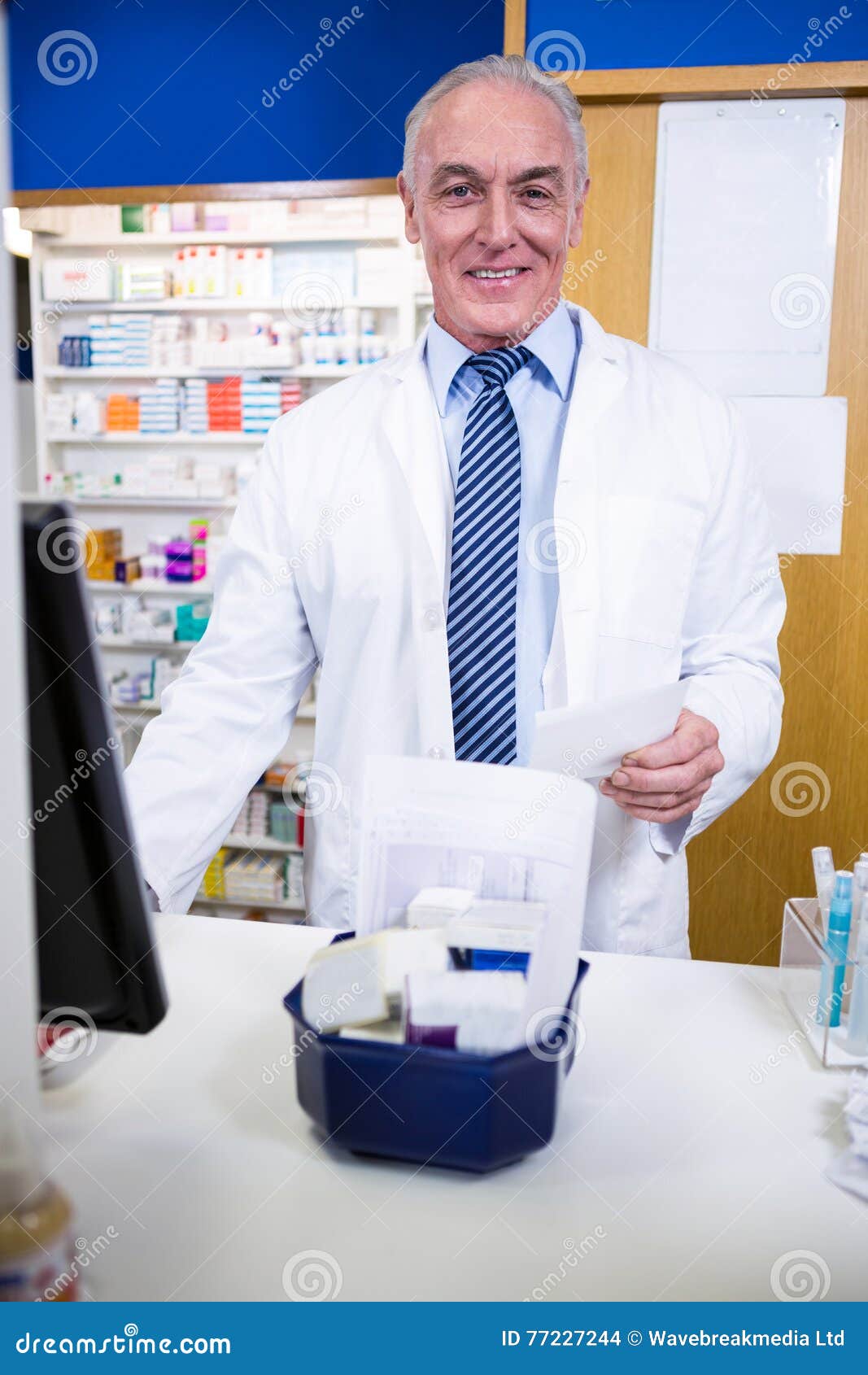 Pharmacist Standing at Counter Stock Photo - Image of pharmaceutical ...
