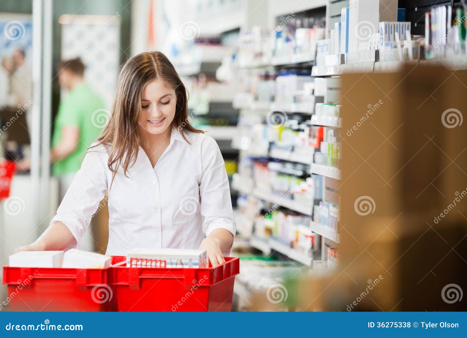 Pharmacist Stocking Shelves in Pharmacy Stock Photo - Image of ...