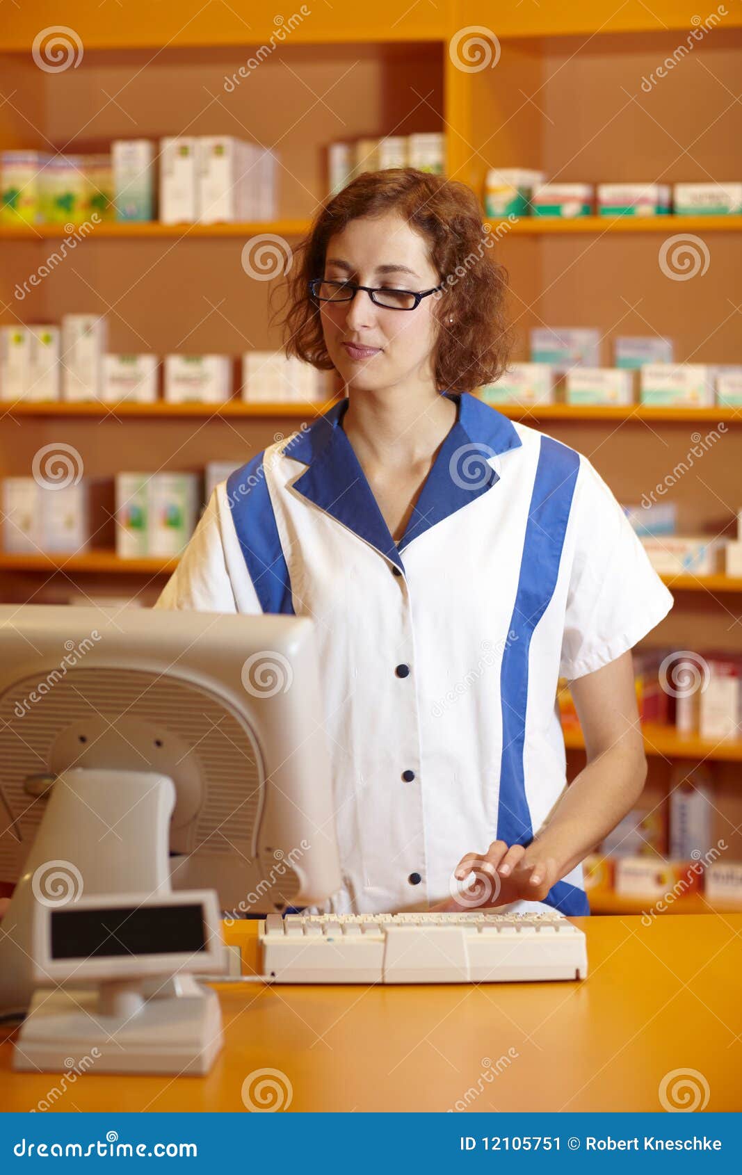 Pharmacist using computer stock image. Image of european - 12105751