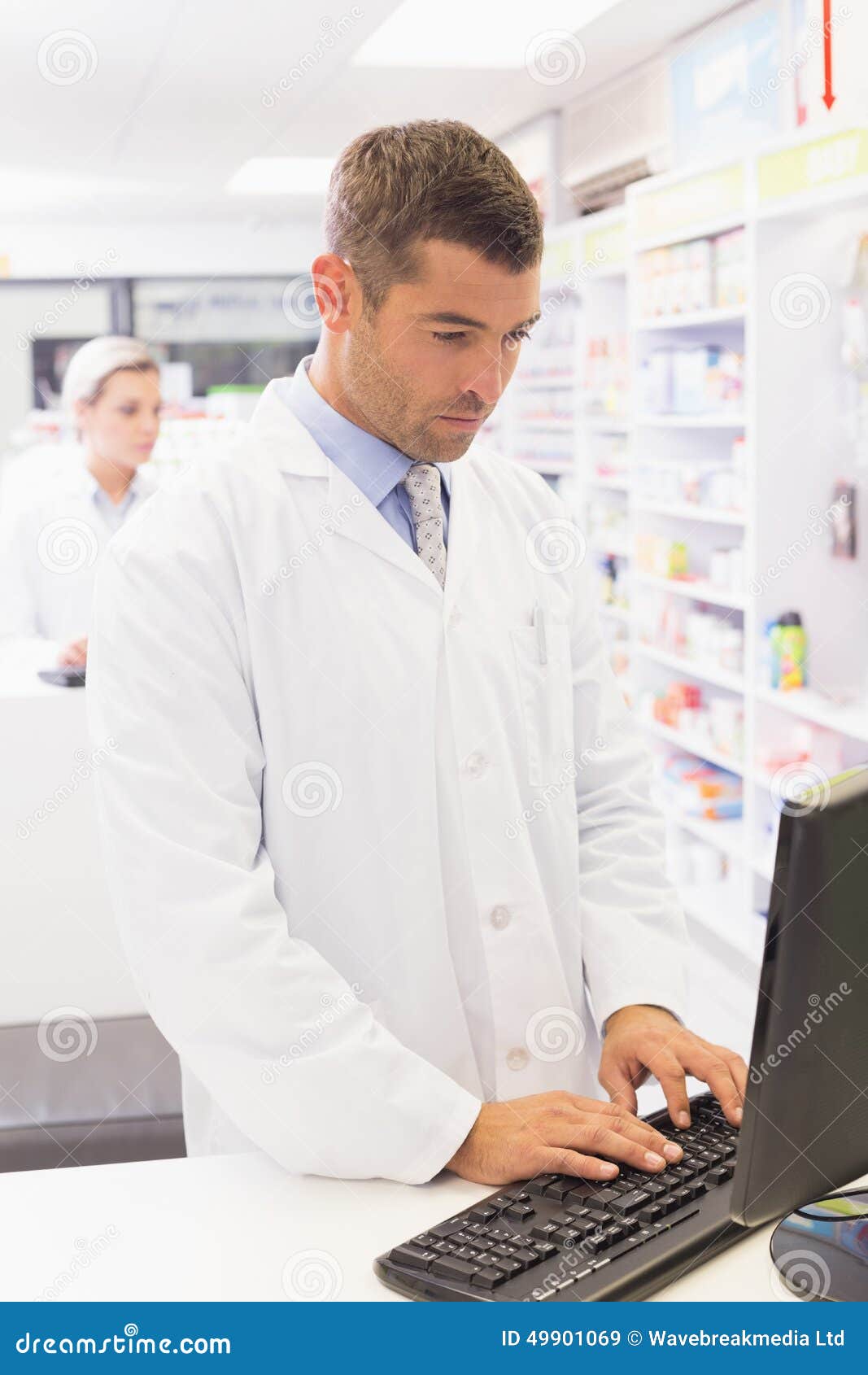 Pharmacist Using the Computer Stock Image - Image of female, partners ...