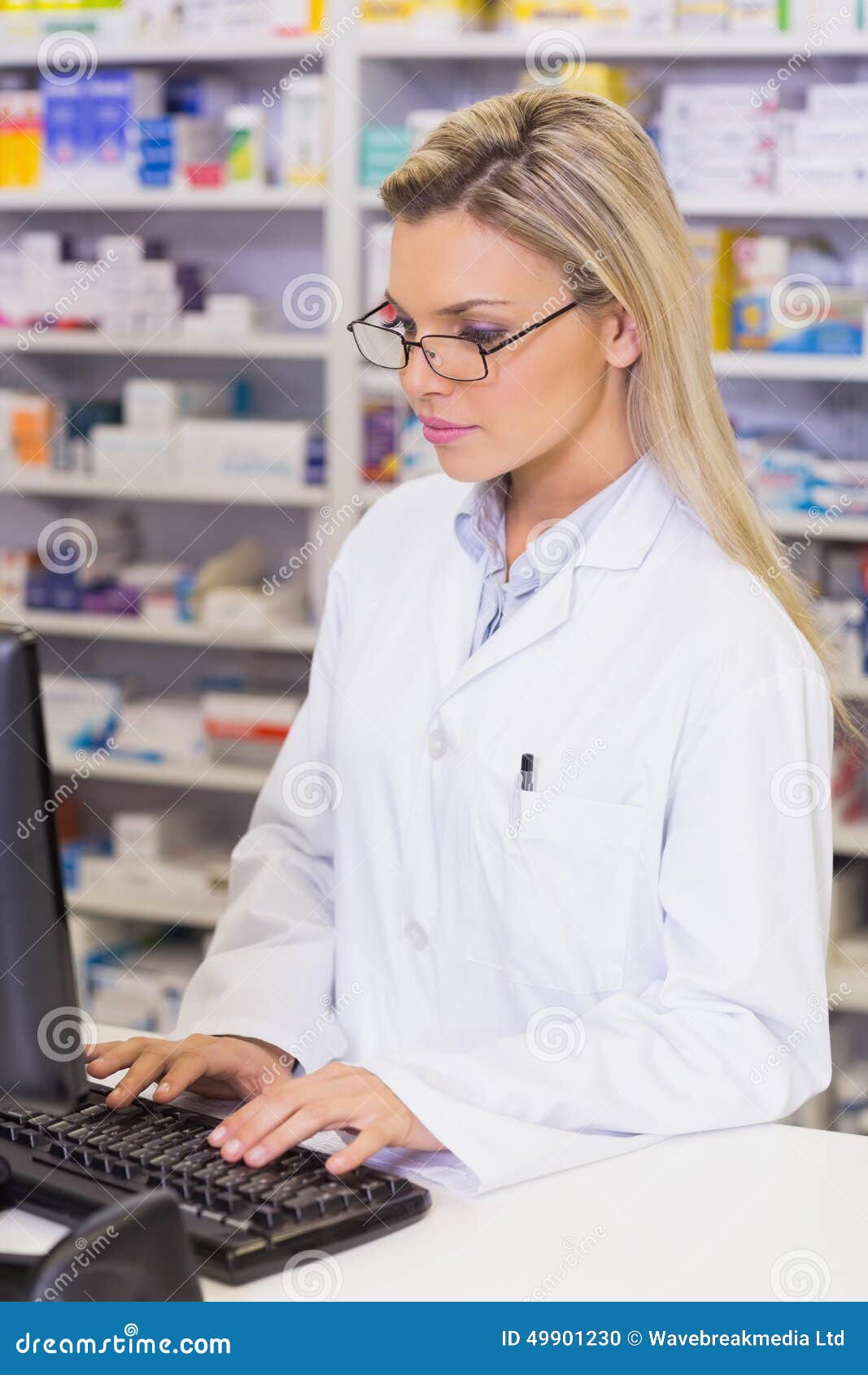 Pharmacist Using the Computer Stock Photo - Image of female, medication ...