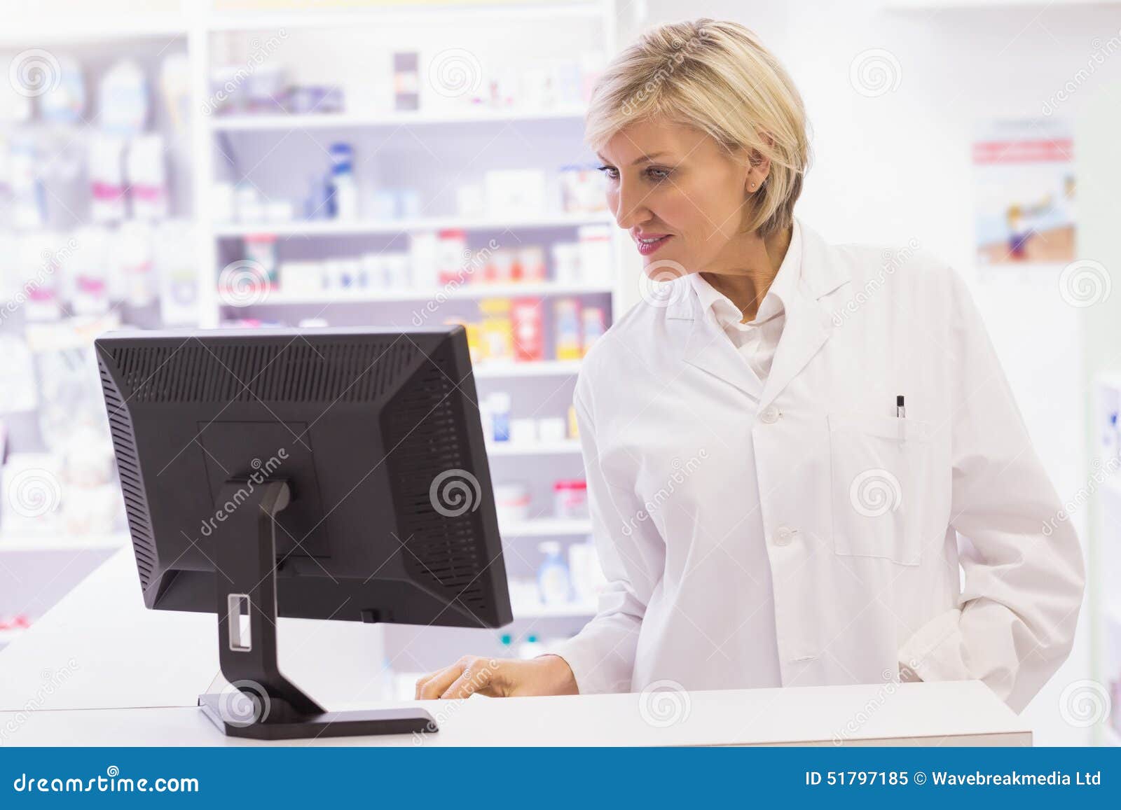 Pharmacist Using the Computer Stock Image - Image of smiling ...