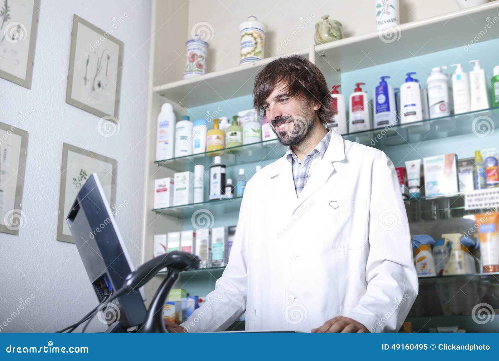 Pharmacist Using a Computer Stock Image - Image of care, desk: 49160495