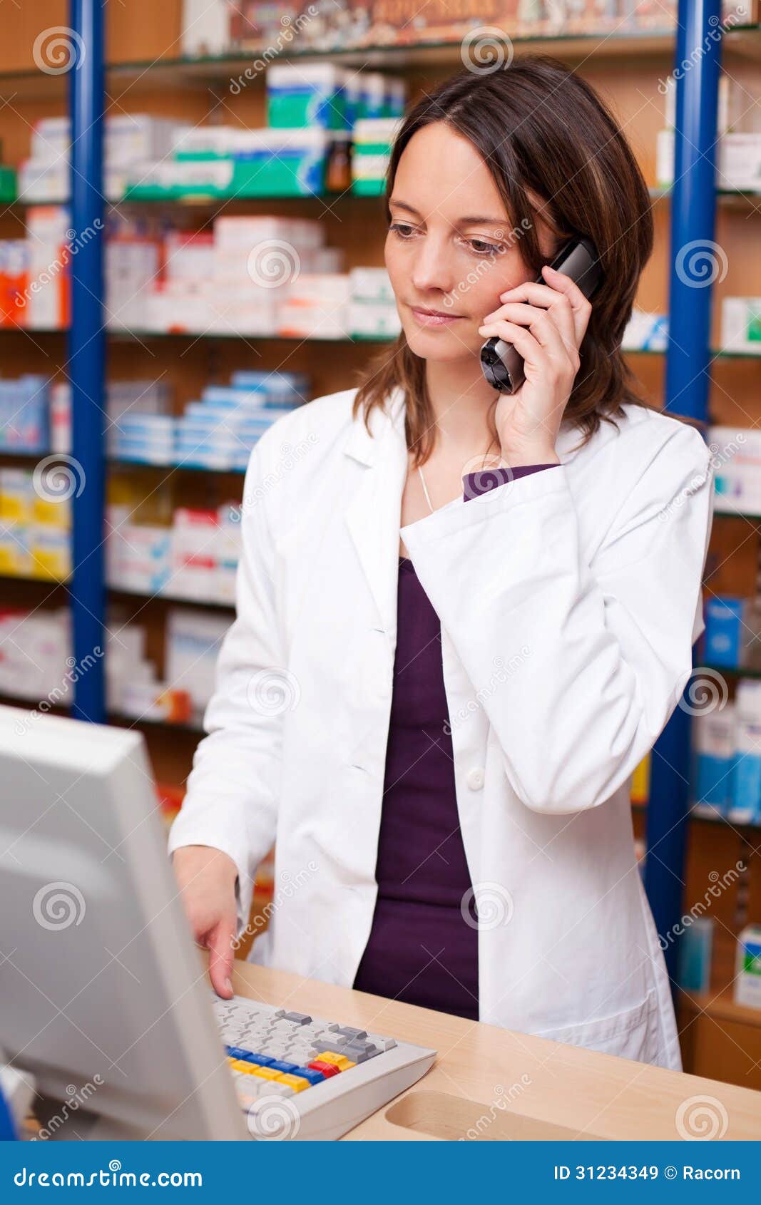 Pharmacist Using Cordless Phone Stock Image - Image of adult, looking ...