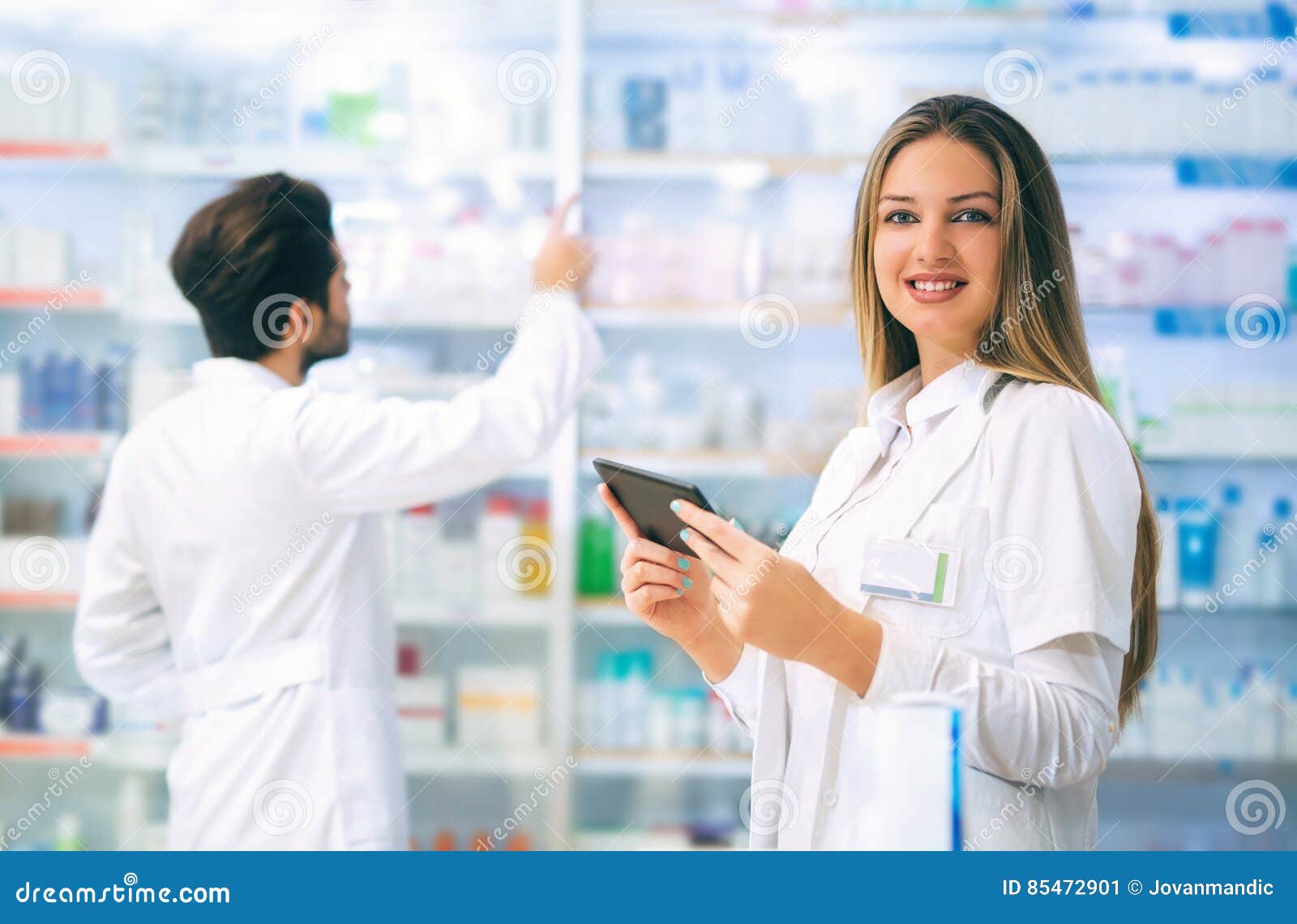 Pharmacist Using Digital Tablet while Checking Medicine Stock Image ...