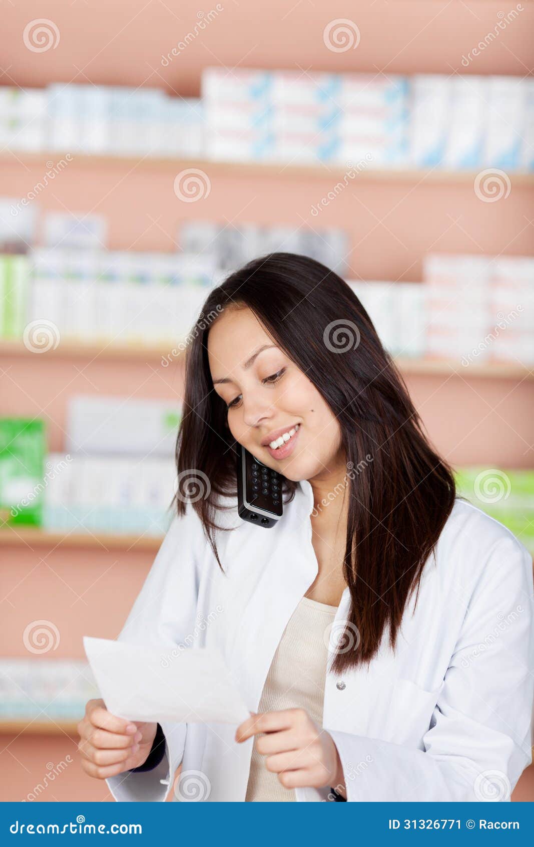 Pharmacist Using Phone in Pharmacy Stock Image - Image of people, focus ...
