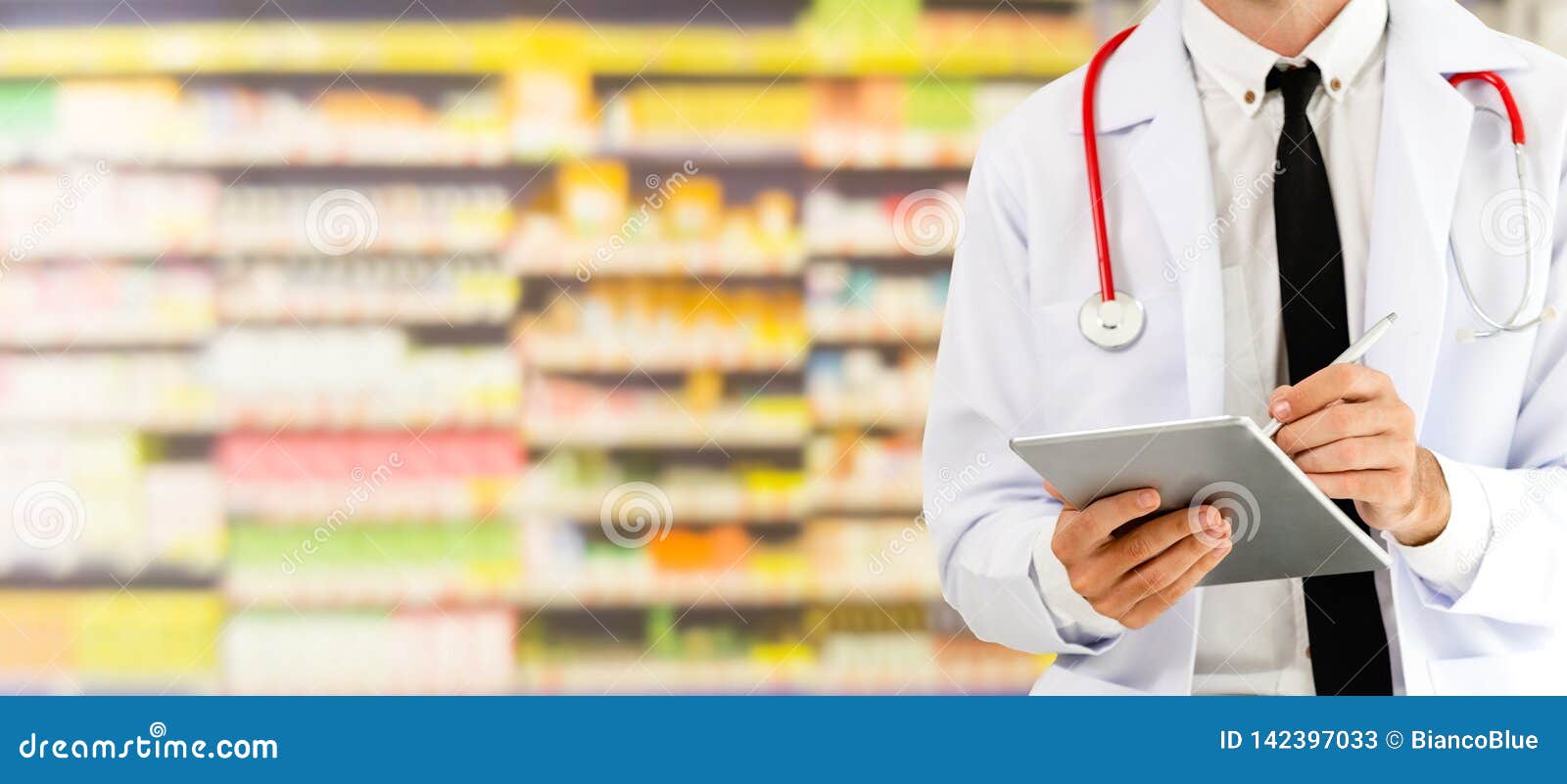 Pharmacist Using Tablet Computer at Pharmacy Stock Image - Image of ...