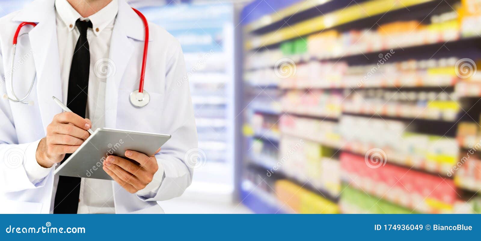Pharmacist Using Tablet Computer at Pharmacy Stock Image - Image of ...