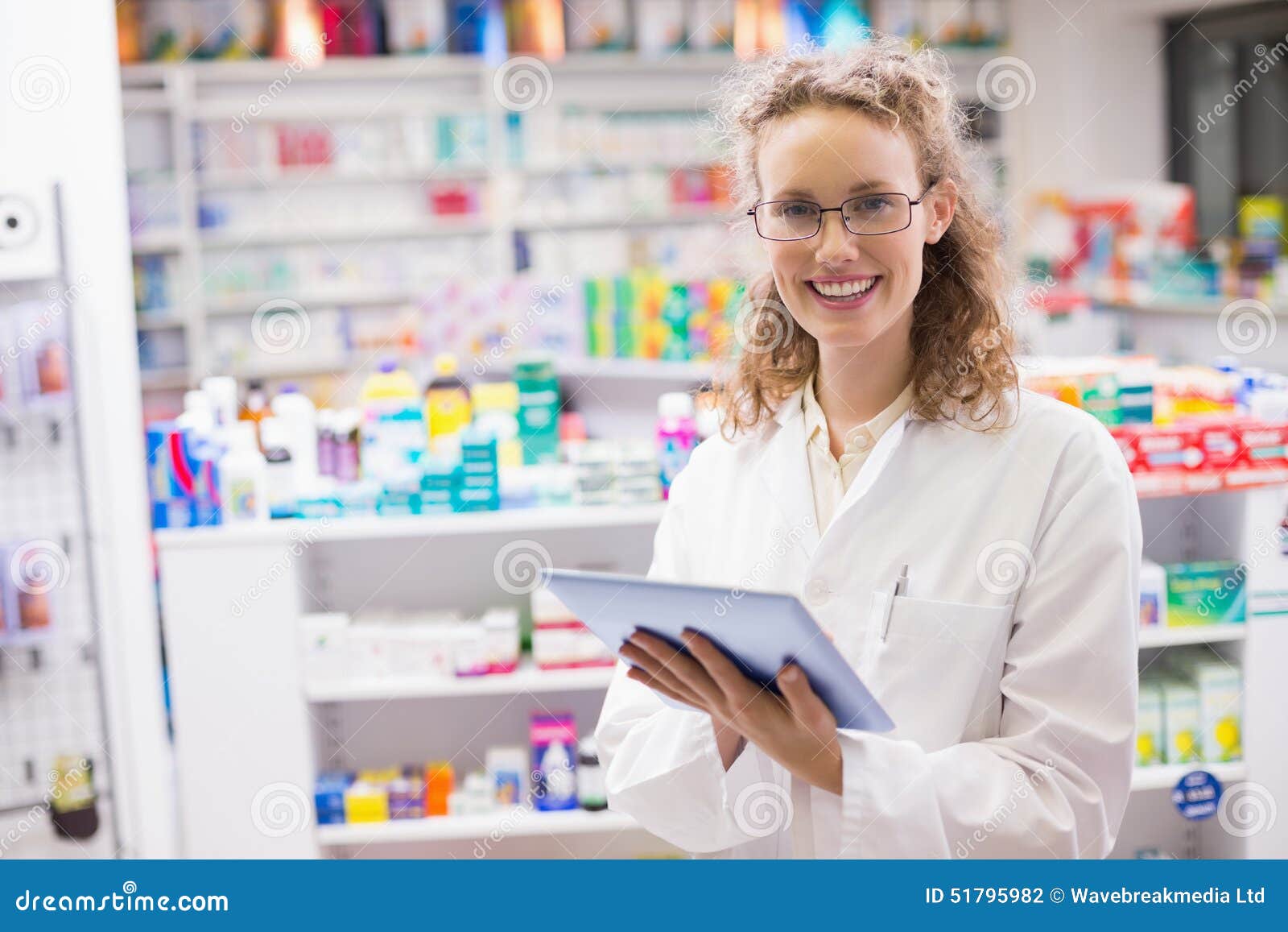 Pharmacist using tablet pc stock photo. Image of indoors - 51795982