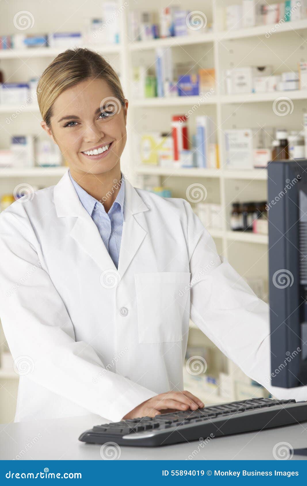 Pharmacist Working on Computer in Pharmacy Stock Image - Image of ...