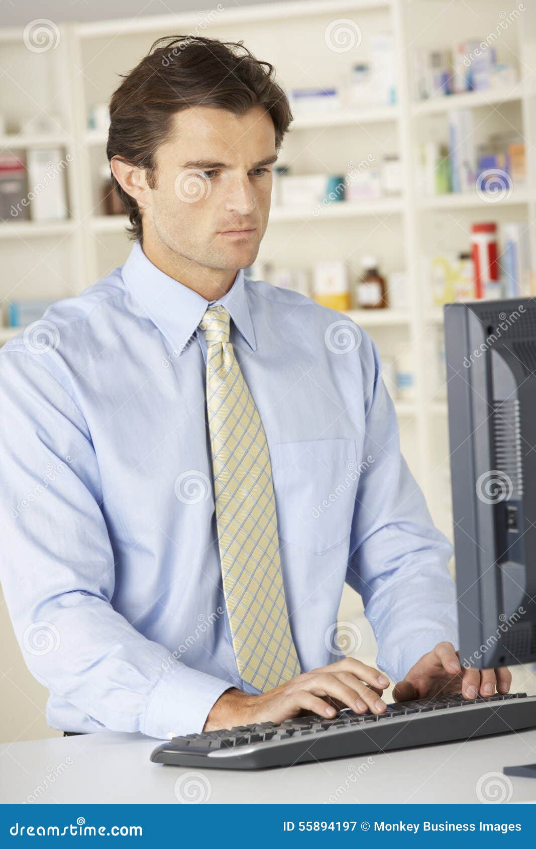 Pharmacist Working on Computer in Pharmacy Stock Image - Image of ...