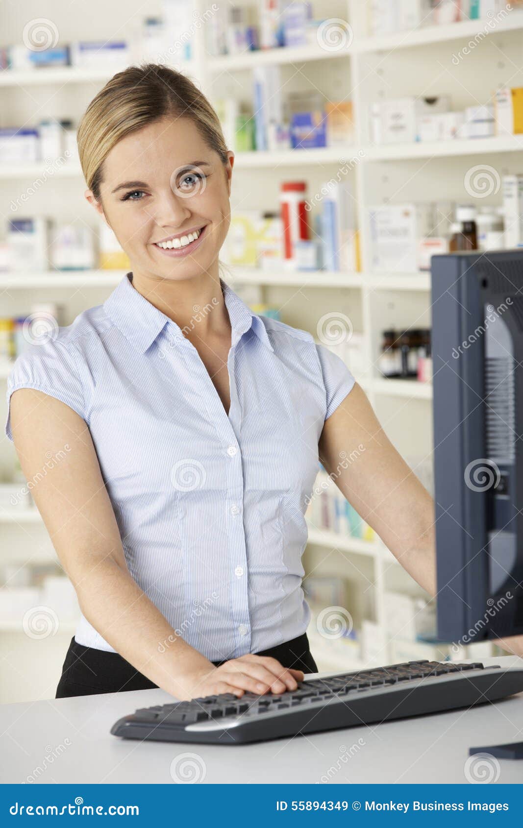 Pharmacist Working on Computer in Pharmacy Stock Image - Image of ...