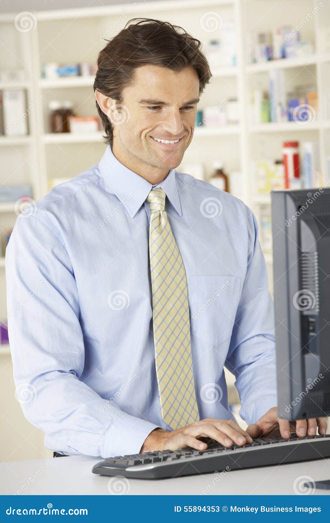 Pharmacist Working on Computer in Pharmacy Stock Image - Image of ...
