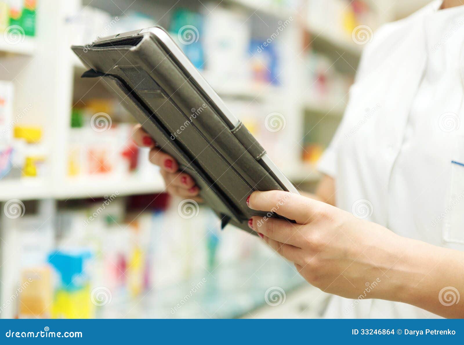Pharmacist Working with a Tablet Pc in the Pharmacy Stock Photo - Image ...