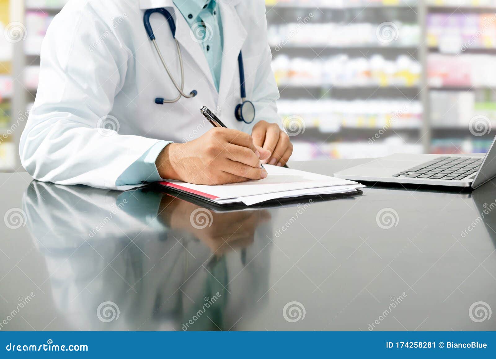 Pharmacist Writes on Documents at Pharmacy Stock Image - Image of ...