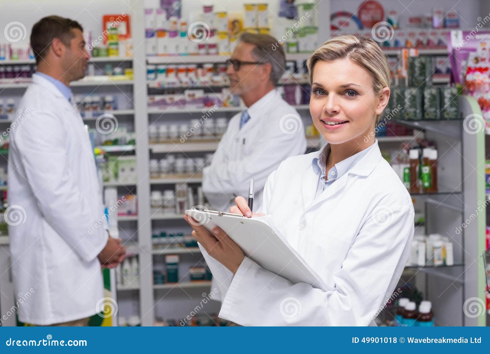 Pharmacist Writing on Clipboard Stock Photo - Image of cheerful, care ...